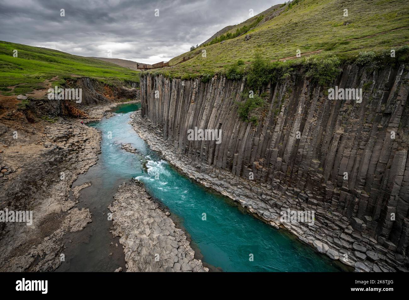 Stuolagil Canyon, turquoise river between basalt columns, Egilsstadir ...