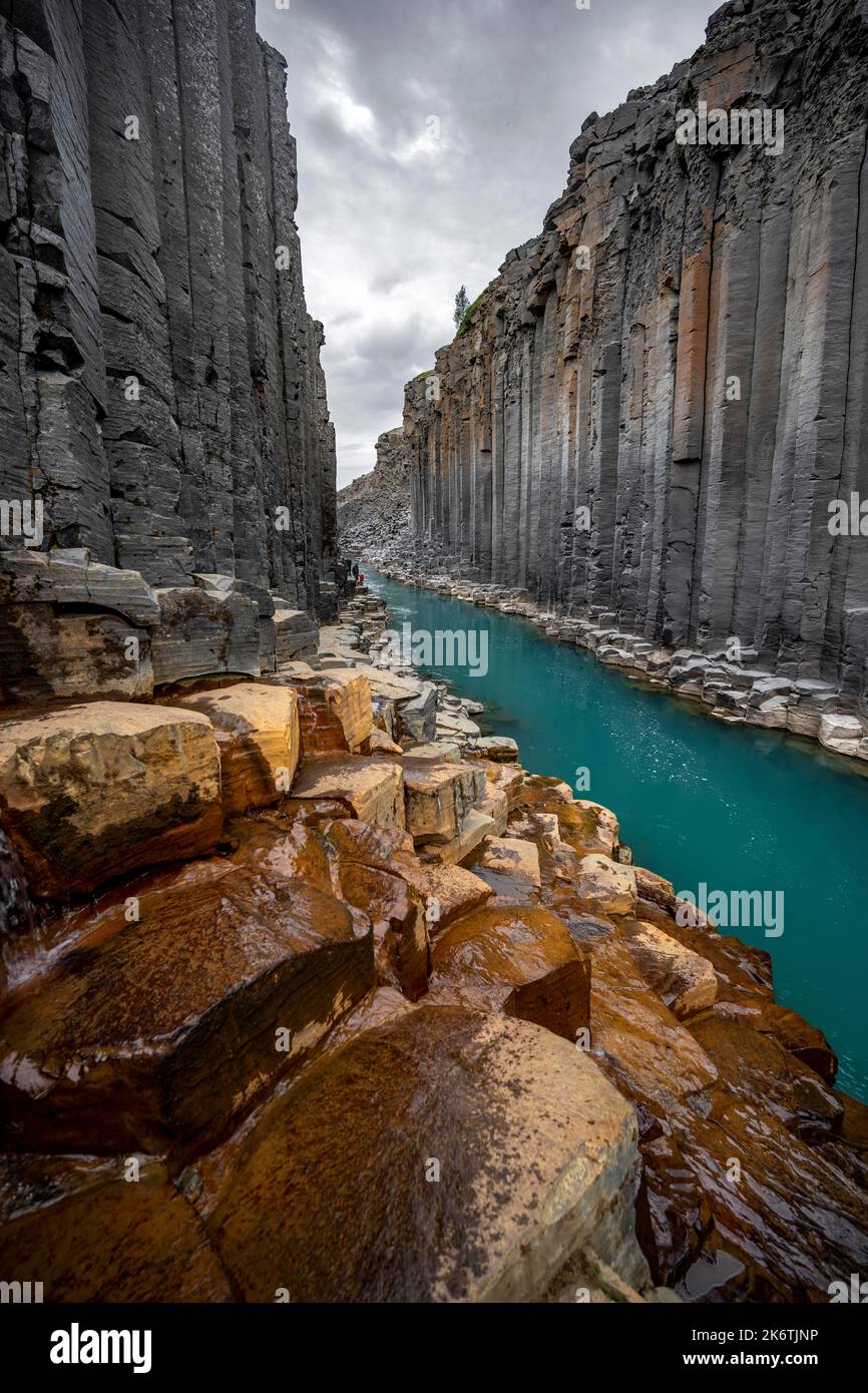 Stuolagil Canyon, turquoise river between basalt columns, Egilsstadir ...