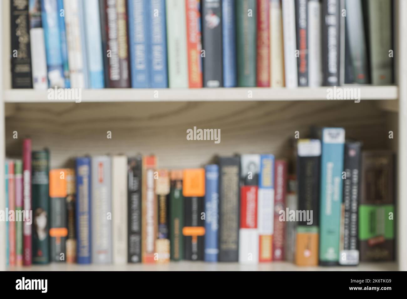 Blurred volumes bookshelf Stock Photo - Alamy