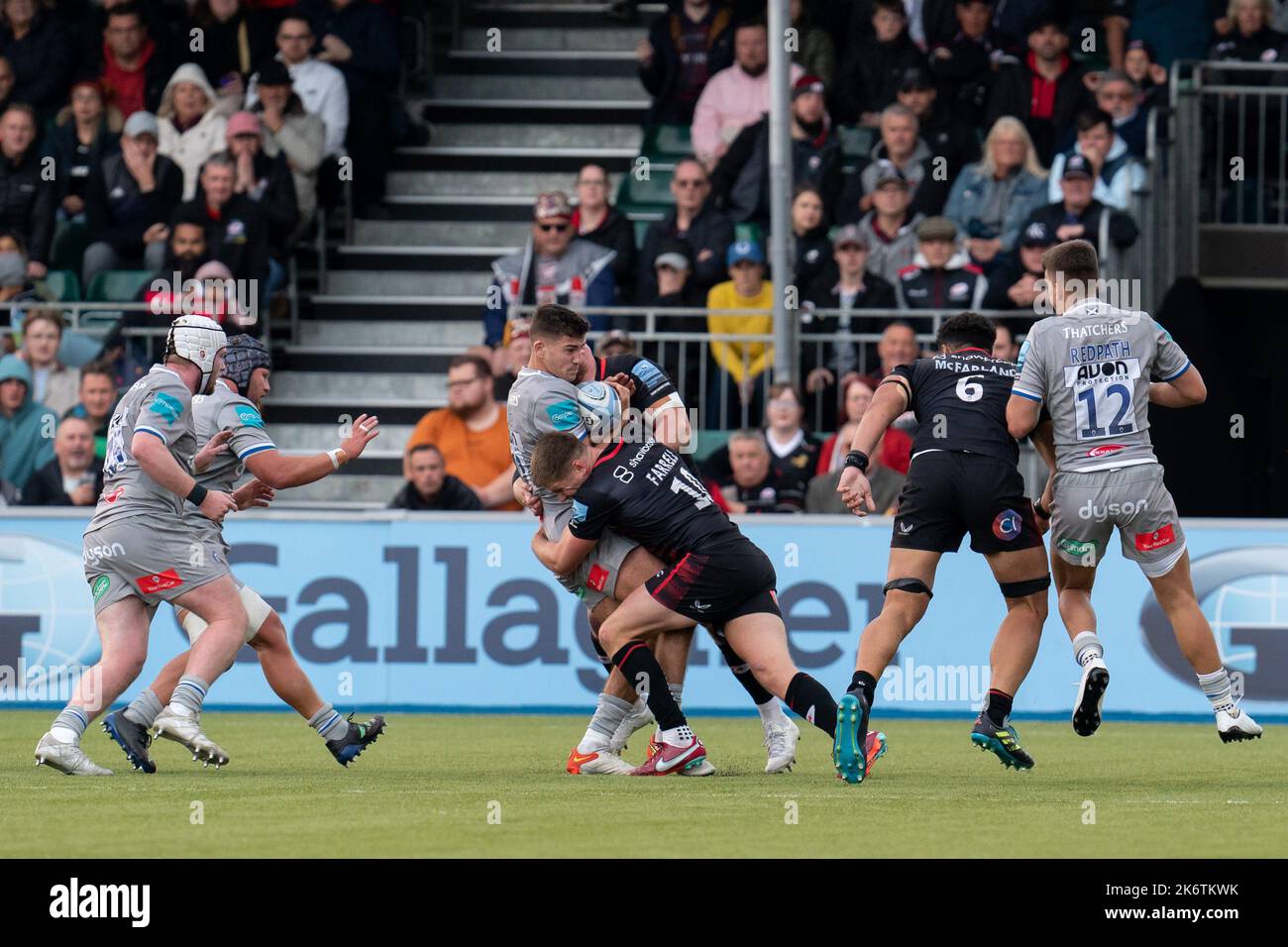 Owen Farrell #10 of Saracens battles with Orlando Bailey #10 of Bath ...