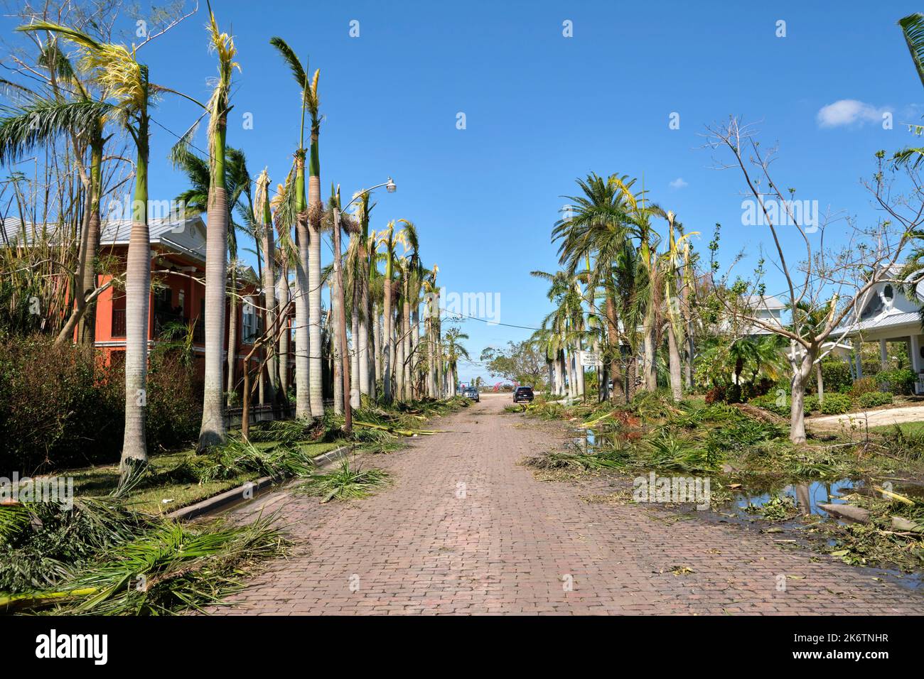 Town street with scattered debris after hurricane Ian in Florida ...