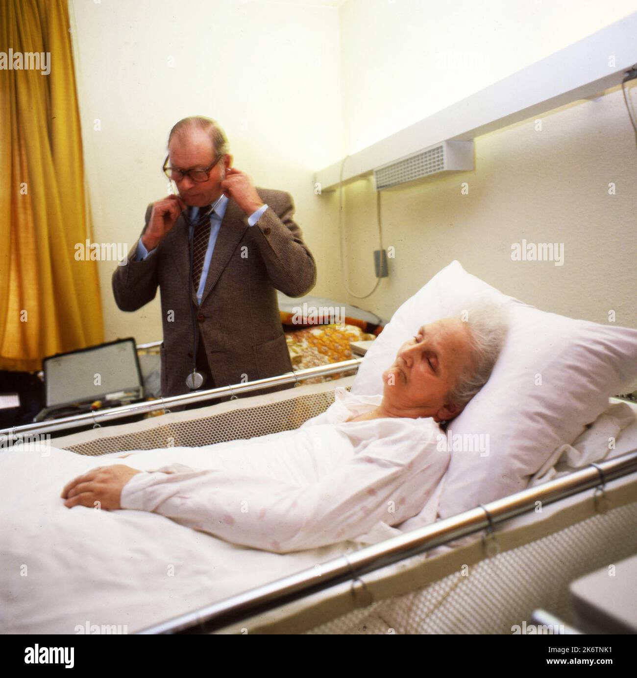Ruhr. Hospital. Visiting a senior citizen. Doctor. Patient. ca 1979-80 ...