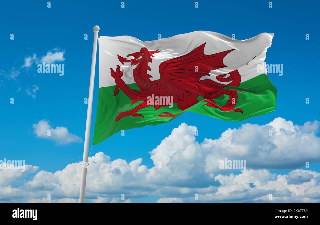 flag of Celtic peoples Welsh people at cloudy sky background, panoramic ...