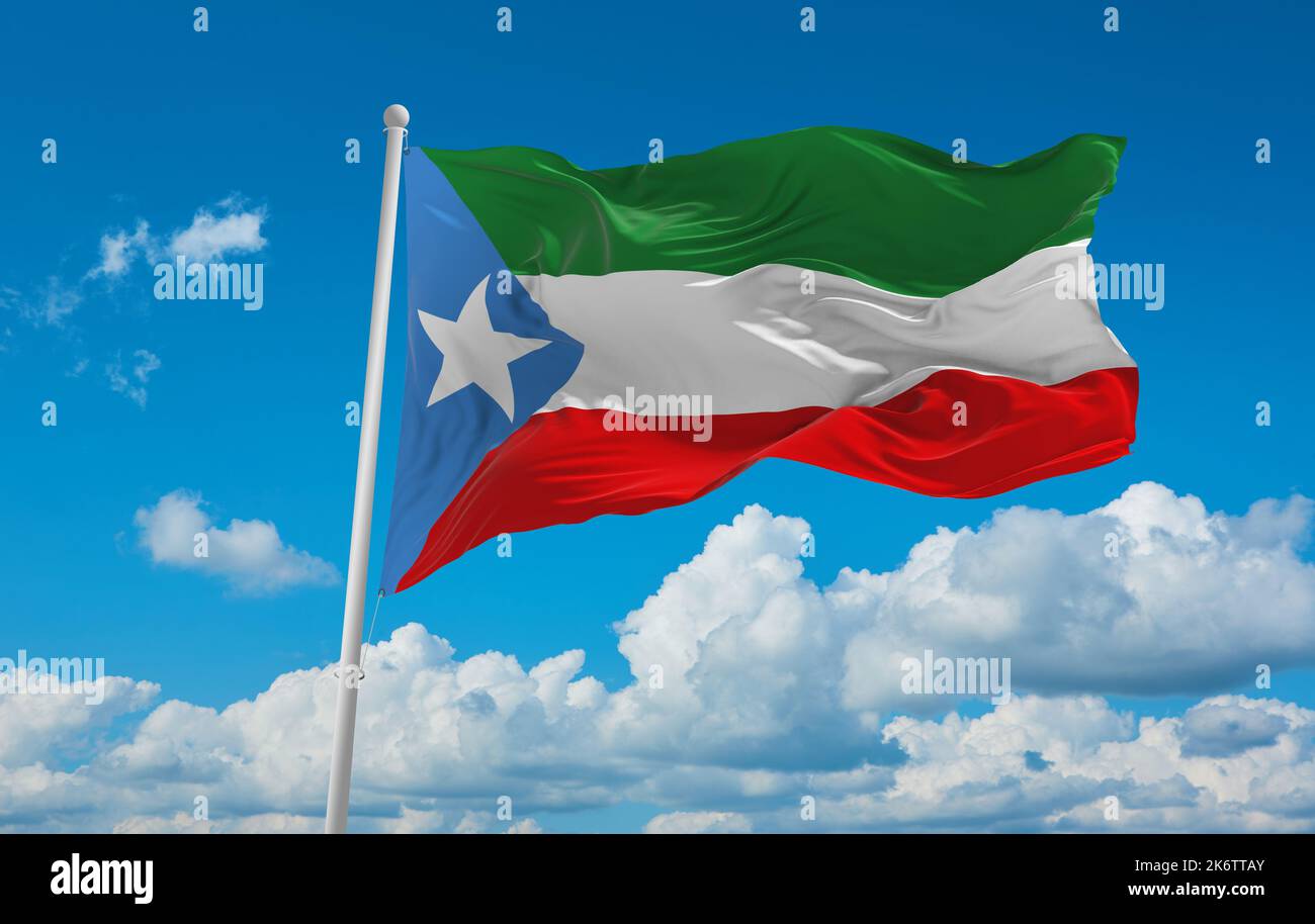 flag of Cushitic peoples Ethiopia Somalis at cloudy sky background ...