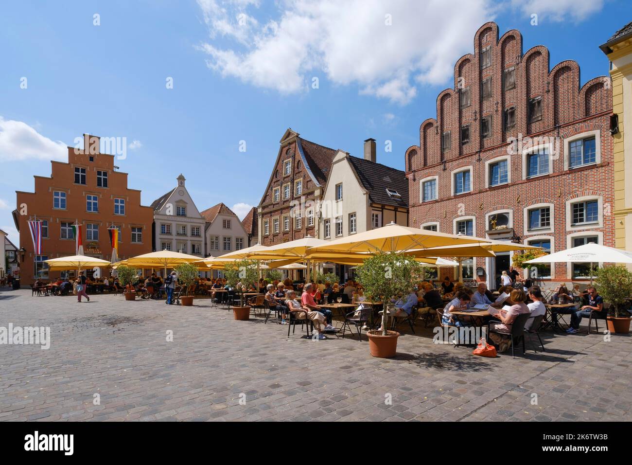 Historic merchants' houses and street cafe on the market square, Old ...