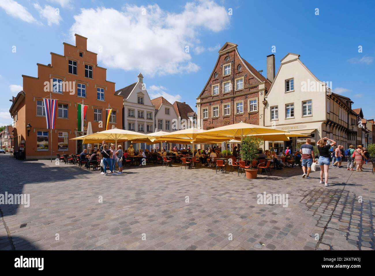 Historic merchants' houses and street cafe on the market square, Old ...