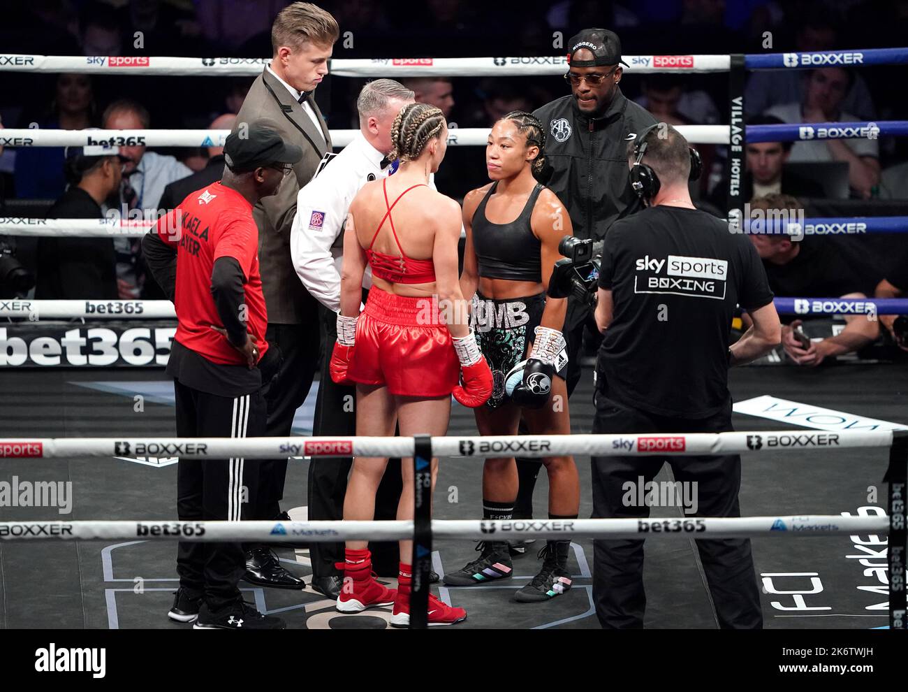 Alycia Baumgardner and Mikaela Mayer exchange punches during their ...