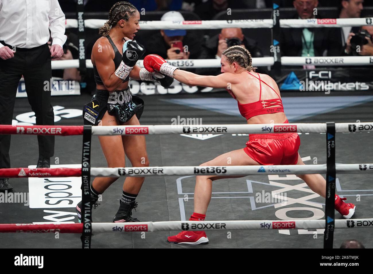 Alycia Baumgardner and Mikaela Mayer exchange punches during their ...