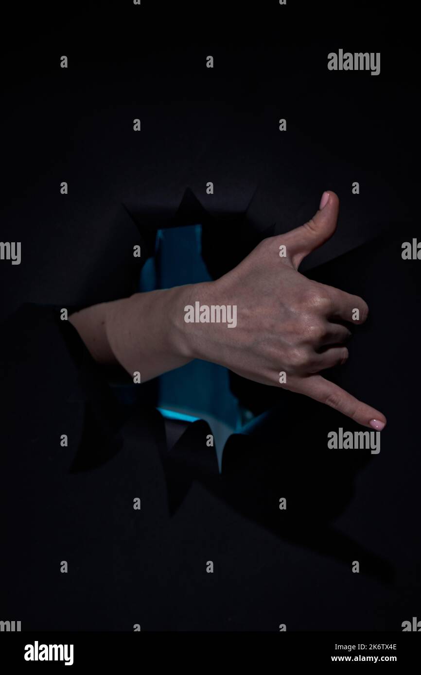 Female hand showing the gesture with extended up the little finger and ...