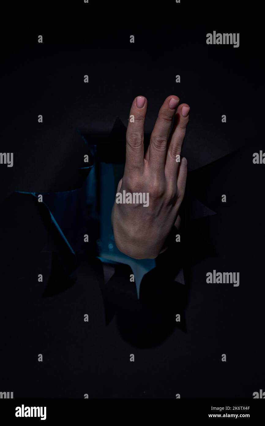 Woman hand over black isolated background showing 3 fingers Stock Photo ...