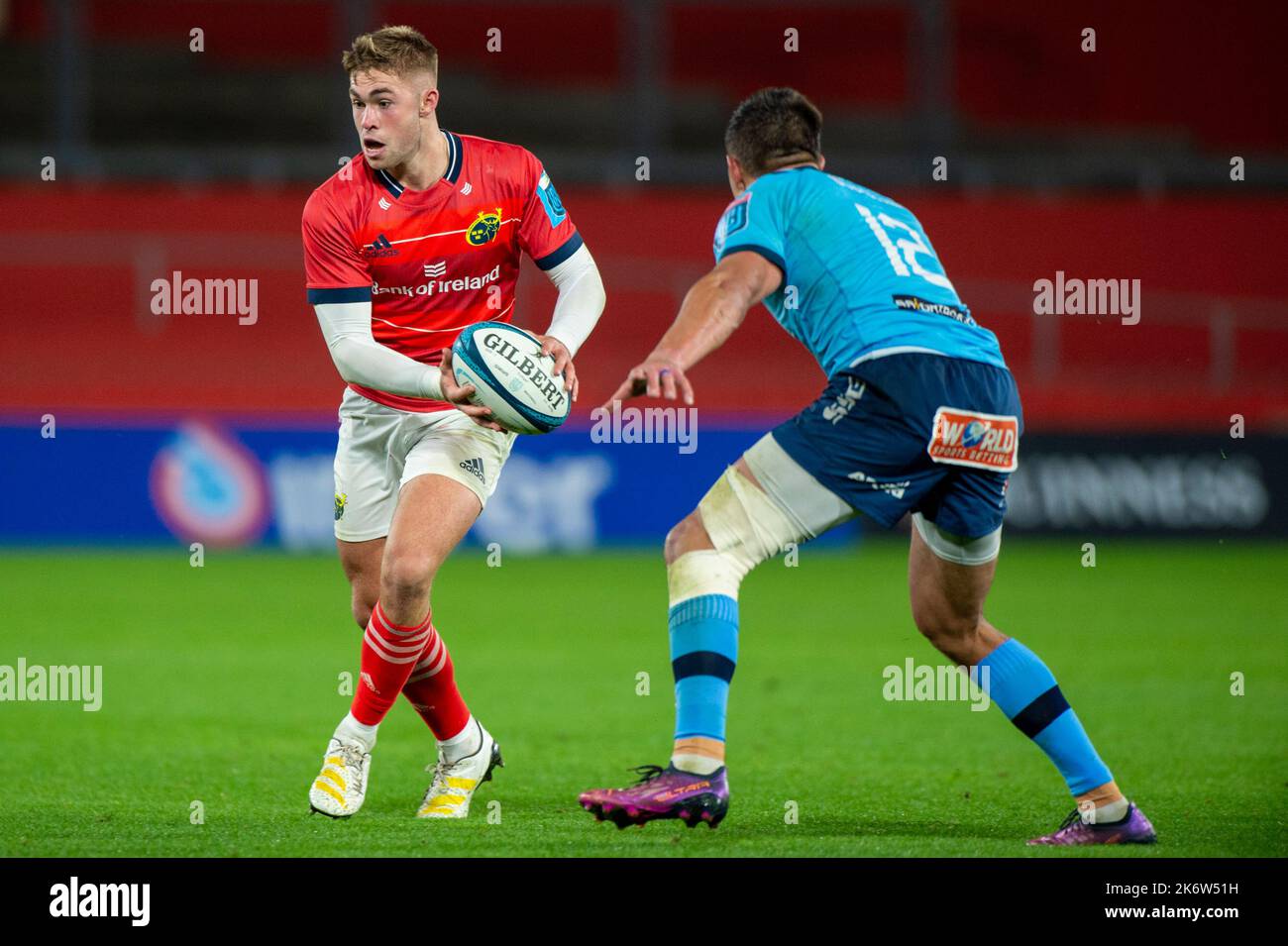 Jack Crowley of Munster and Harold Vorster of Bulls during the United ...
