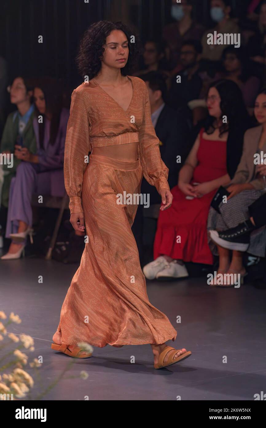 A model dressed in a design by Amber Days during the Ganbu Marra runway ...