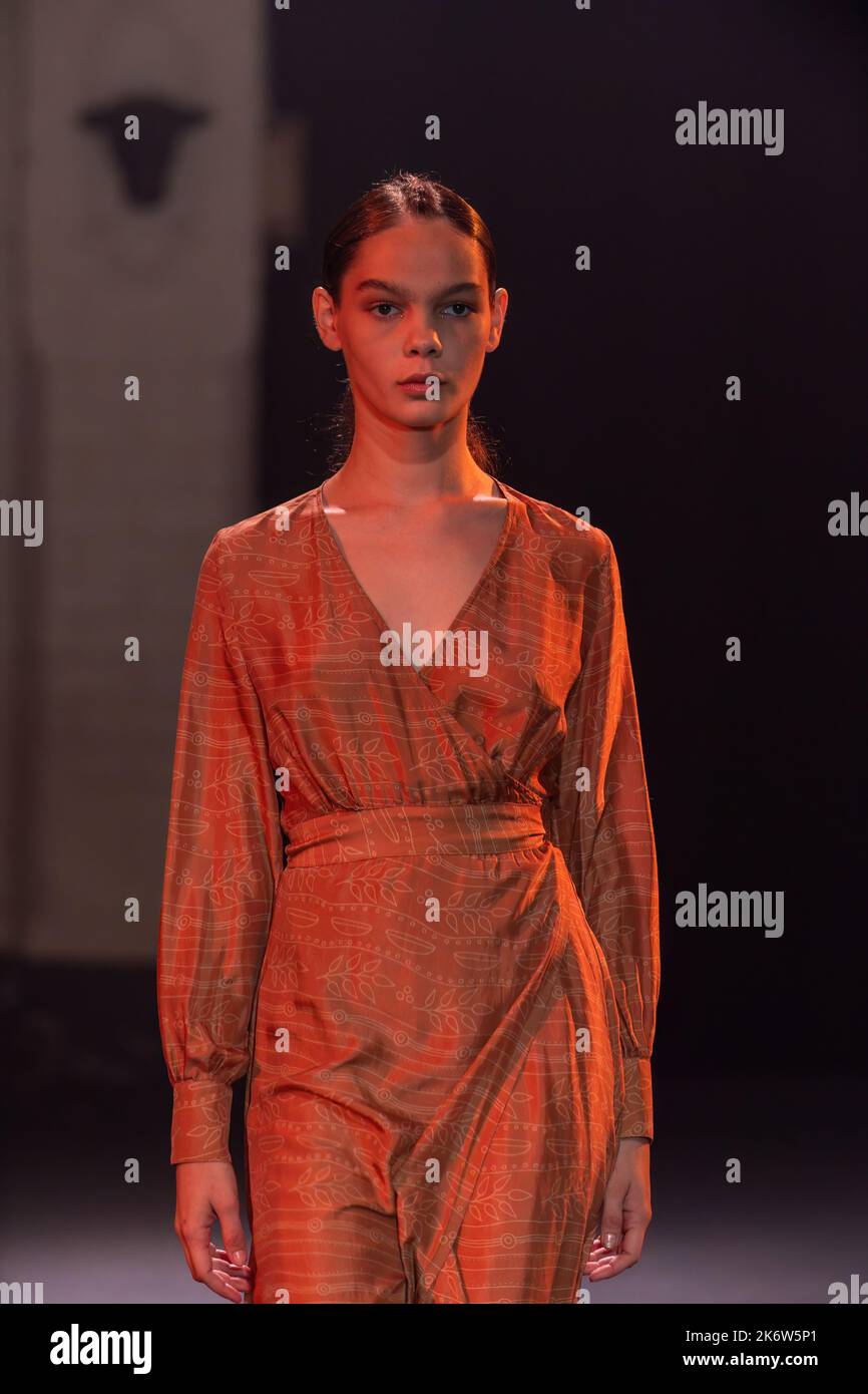 A model dressed in a design by Amber Days during the Ganbu Marra runway ...