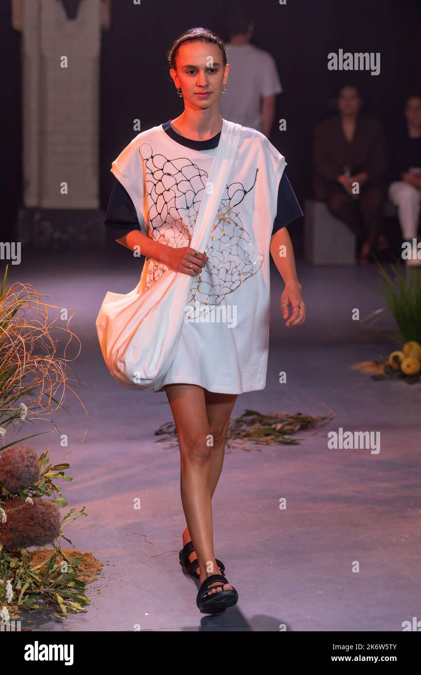 A model dressed in a design by Yanggurdi during the Ganbu Marra runway ...