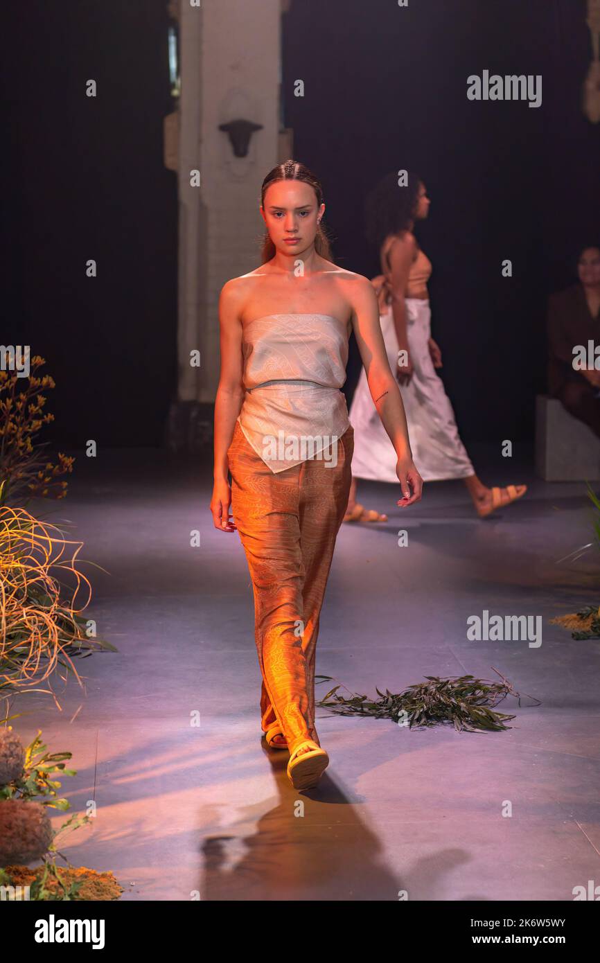 A model dressed in a design by Amber Days during the Ganbu Marra runway ...