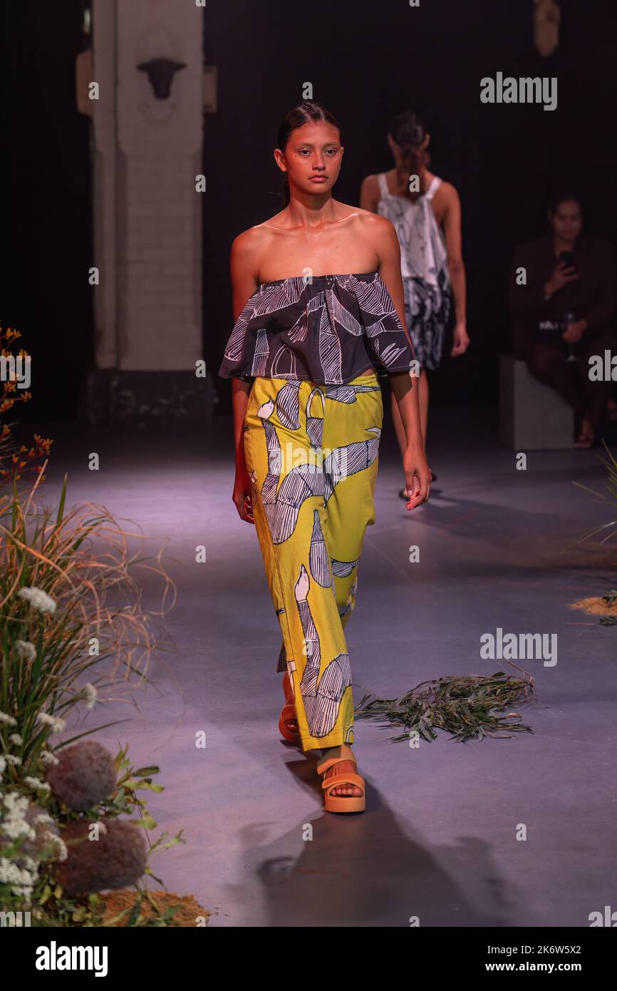 A model dressed in a design by Injalak Arts with Ally Beahan during the ...