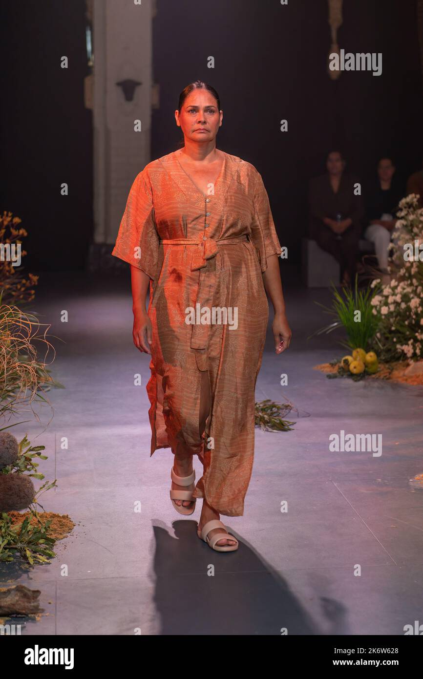 A model dressed in a design by Amber Days during the Ganbu Marra runway ...