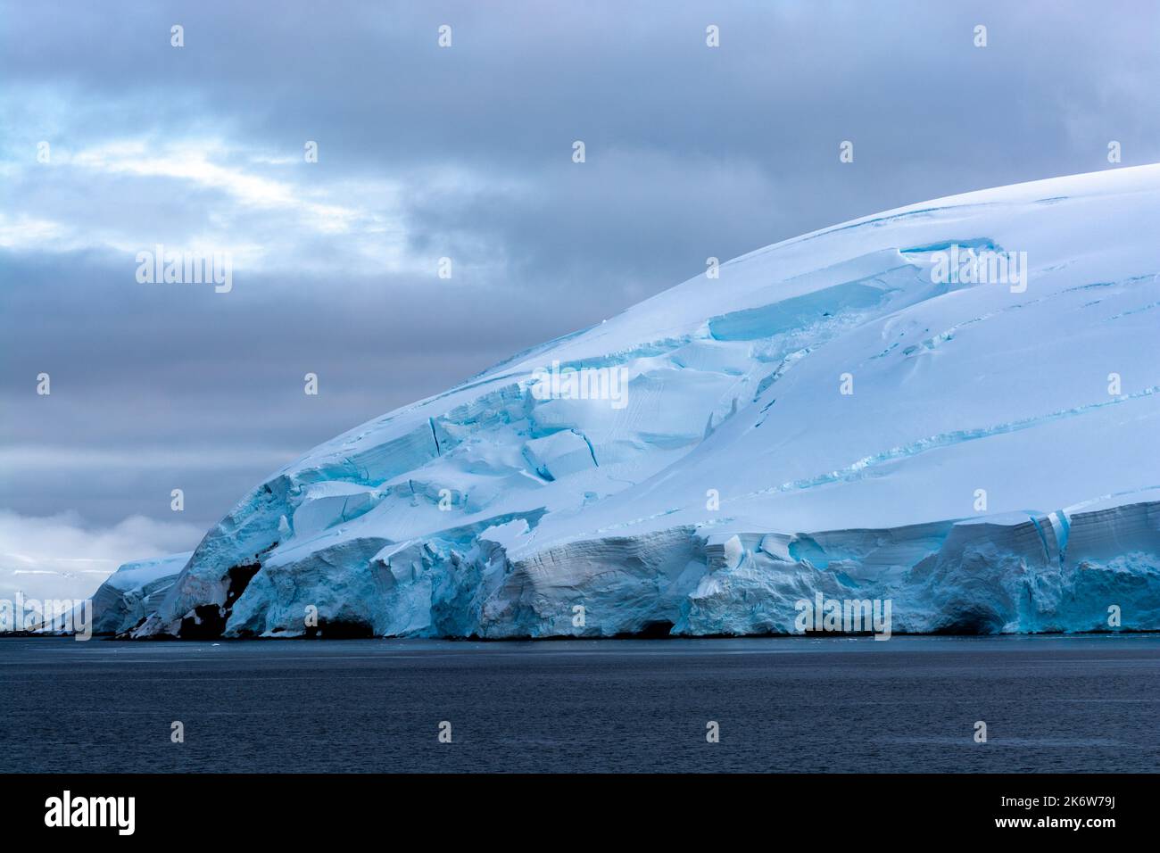 snow covered shoreline. dallmann bay. antarctic peninsula. antarctica ...