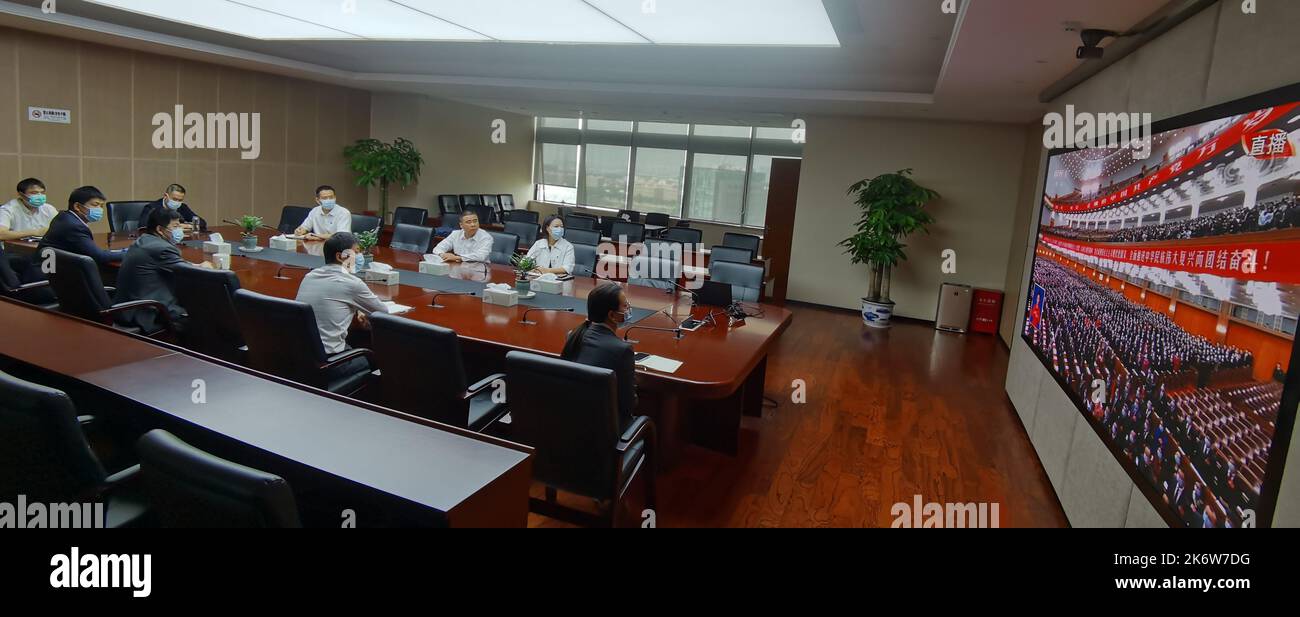 SUZHOU, CHINA - OCTOBER 16, 2022 - Party members and cadres watch the ...