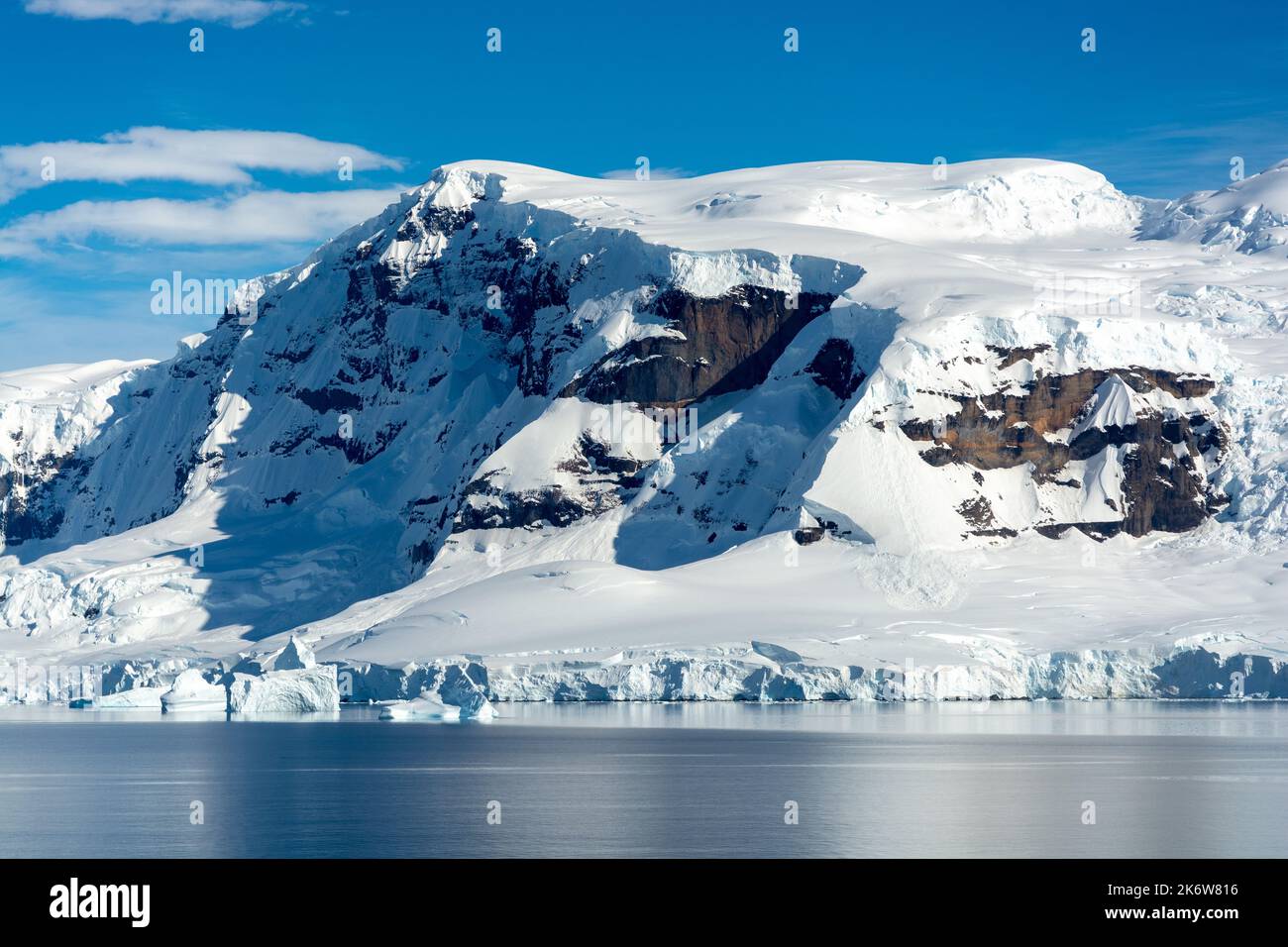 snow covered mountains and ice cliffs. gerlache strait. antarctic ...