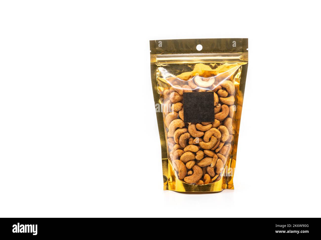 Cashew nuts in window pouch packaging with plastic, gold color ...