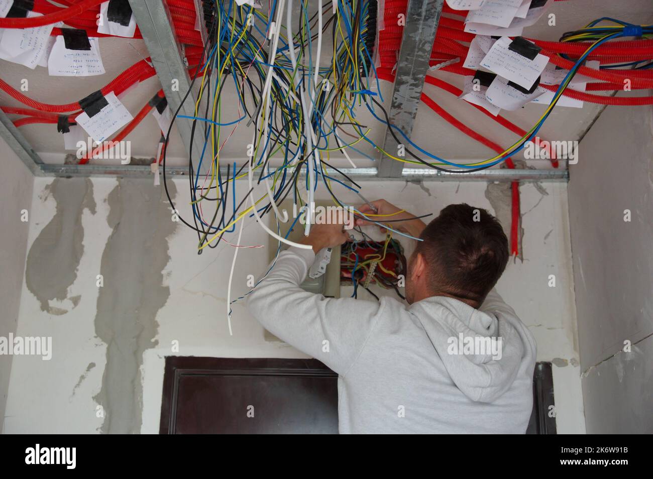 Electrician worker hands install electrical hi-res stock photography ...