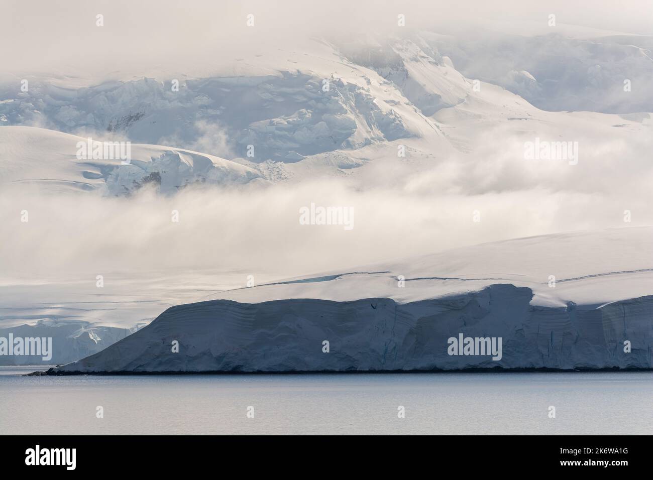 ice cliffs of snow covered shores and mountains of wiencke island ...