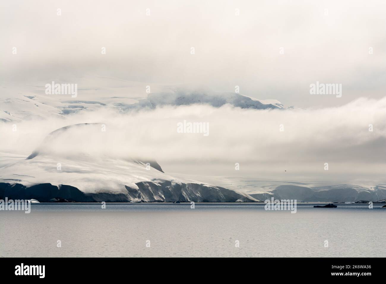 ice cliffs of snow covered shores and mountains of wiencke island ...