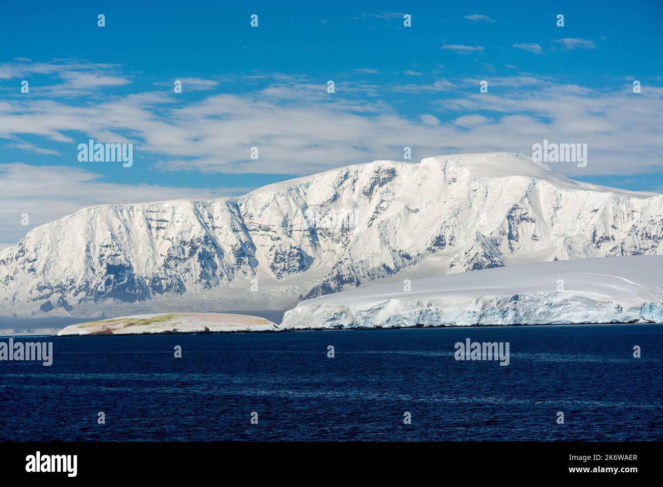 bismarck strait islands with snow covered danco coast behind. antarctic ...
