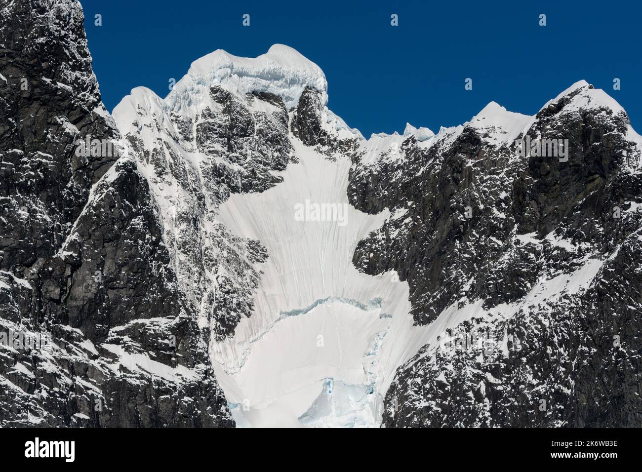 ice and snow detail of humphries peaks on eastern shore of lemaire ...