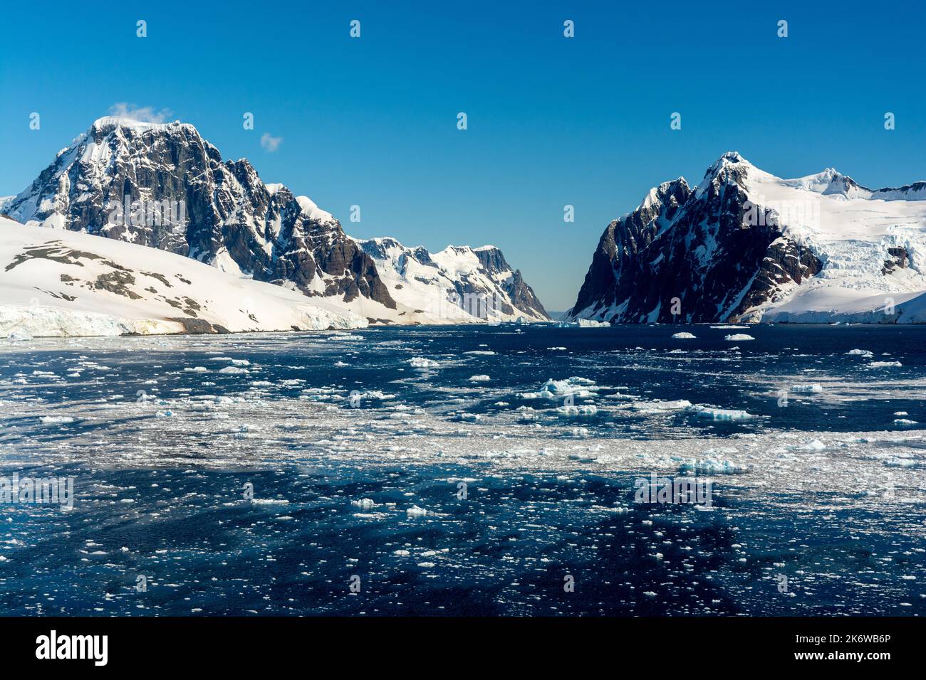 brash ice floating on waters of northern approach to lemaire channel ...