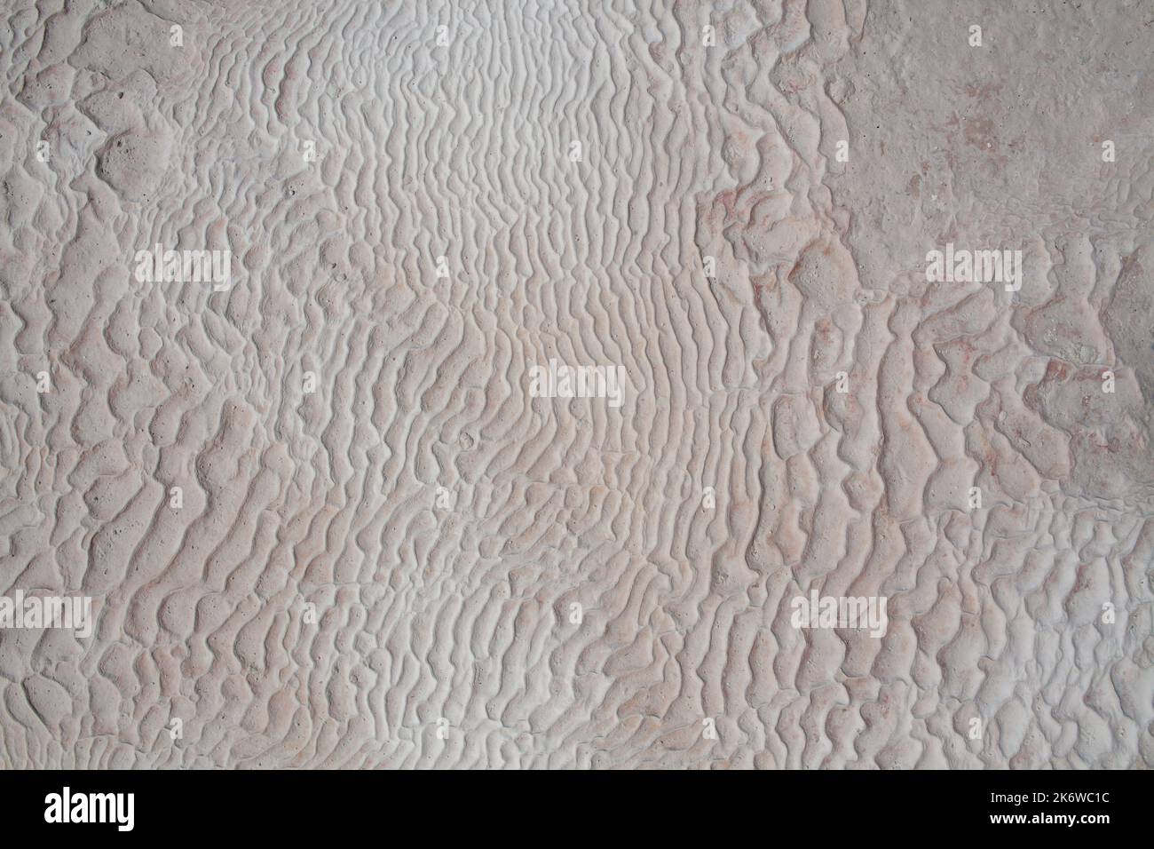 Background of natural white wall Pamukkale calcium travertine in Turkey ...