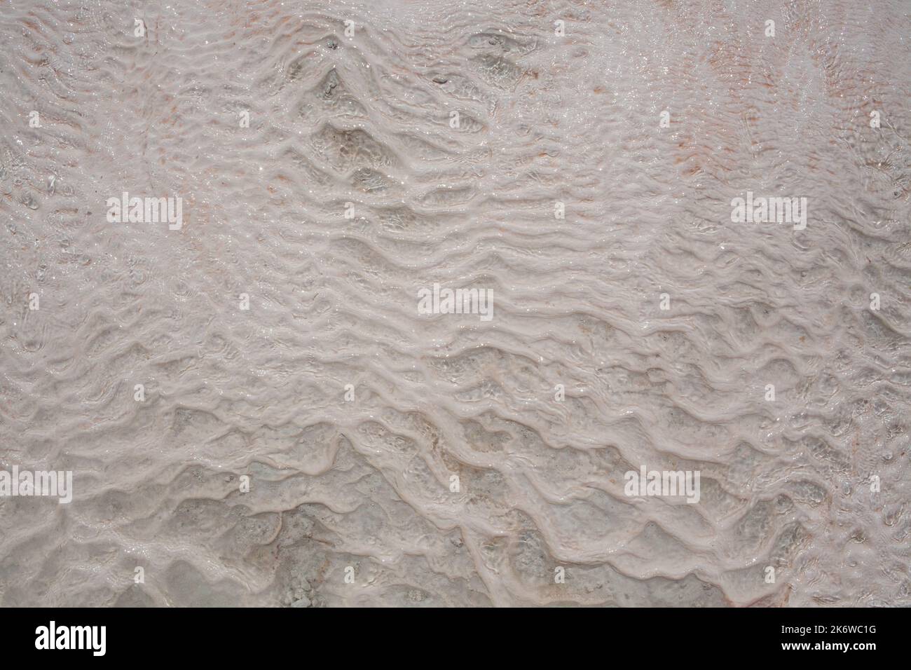 Limestone floor with water in Pamukkale calcium travertine in Turkey ...