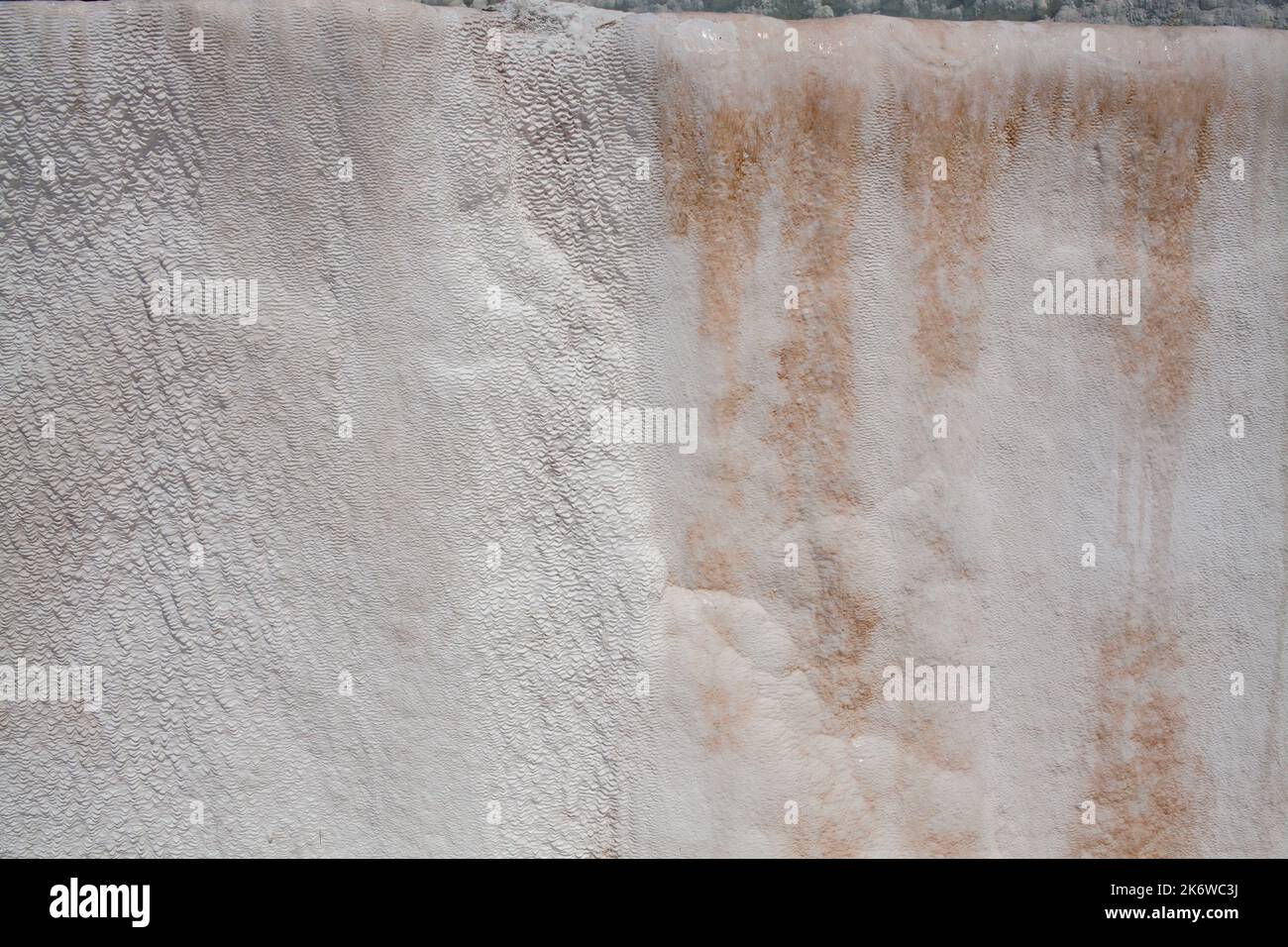 Background of natural white wall Pamukkale calcium travertine in Turkey ...