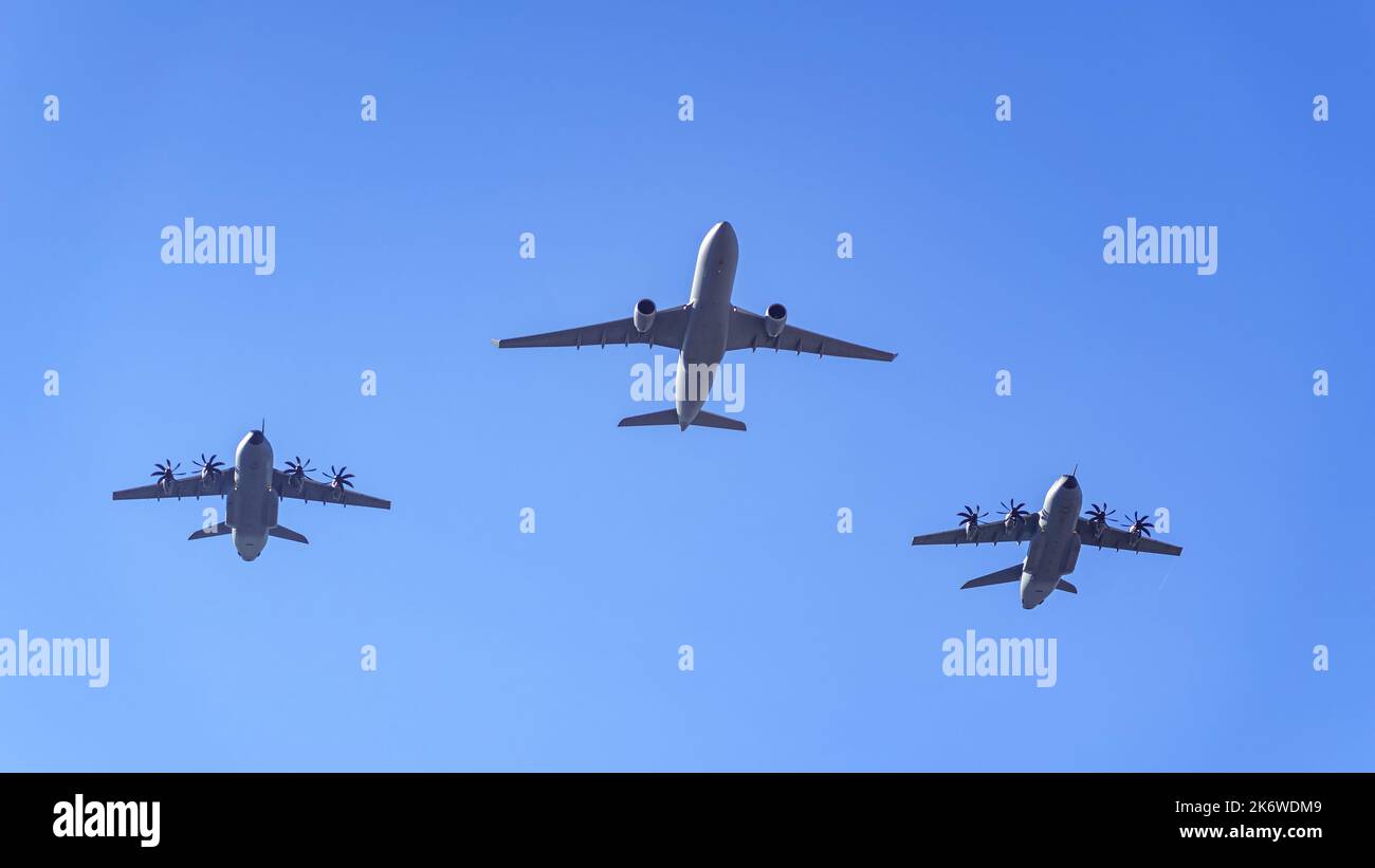 Logistic support planes flying together in the air at a military parade ...