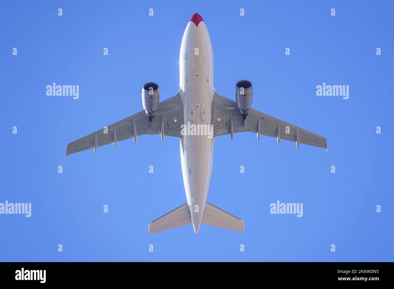 Large military transport plane flying low in a military parade of the ...