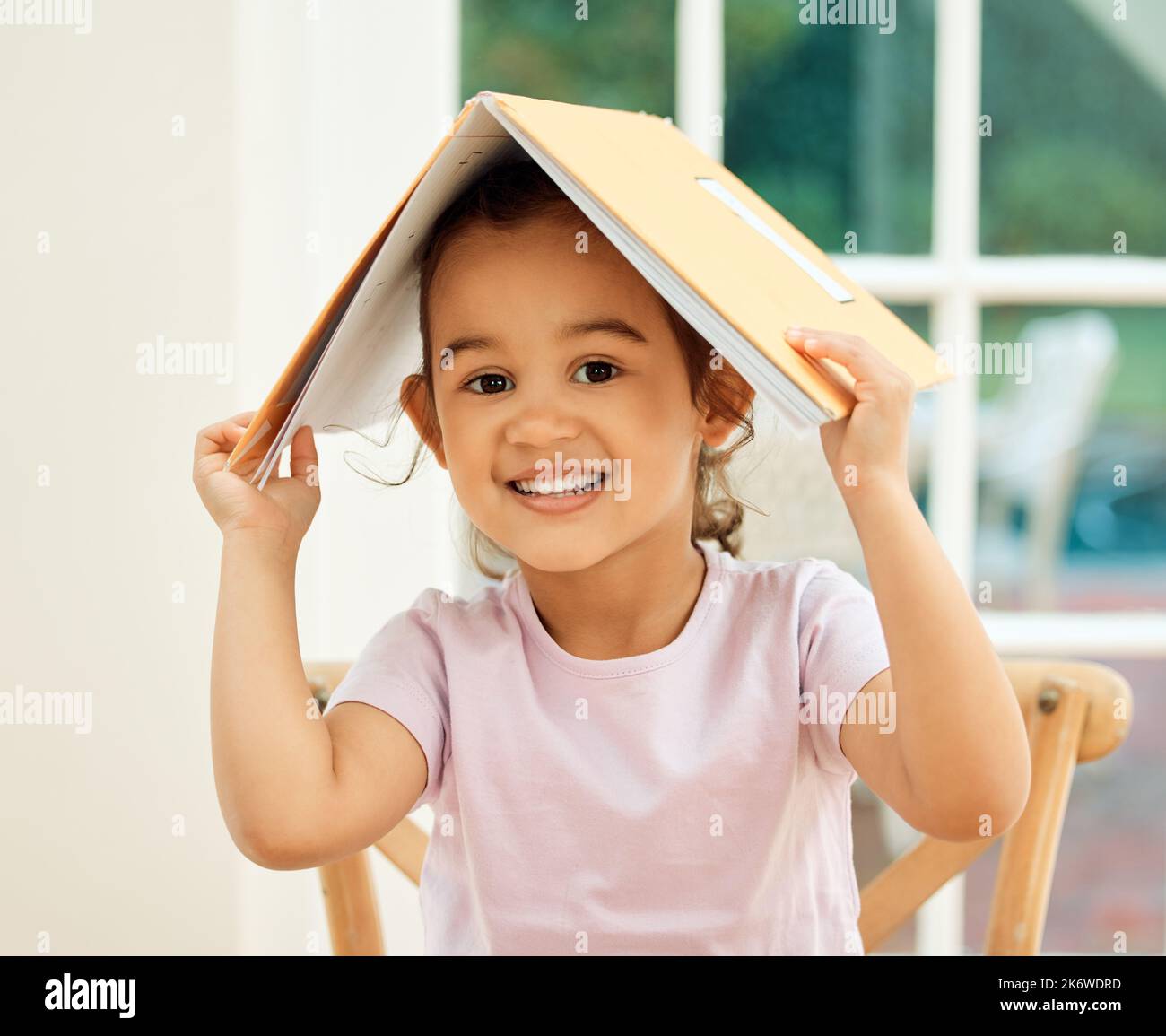 Im absorbing the knowledge. Cropped portrait of an adorable little girl ...