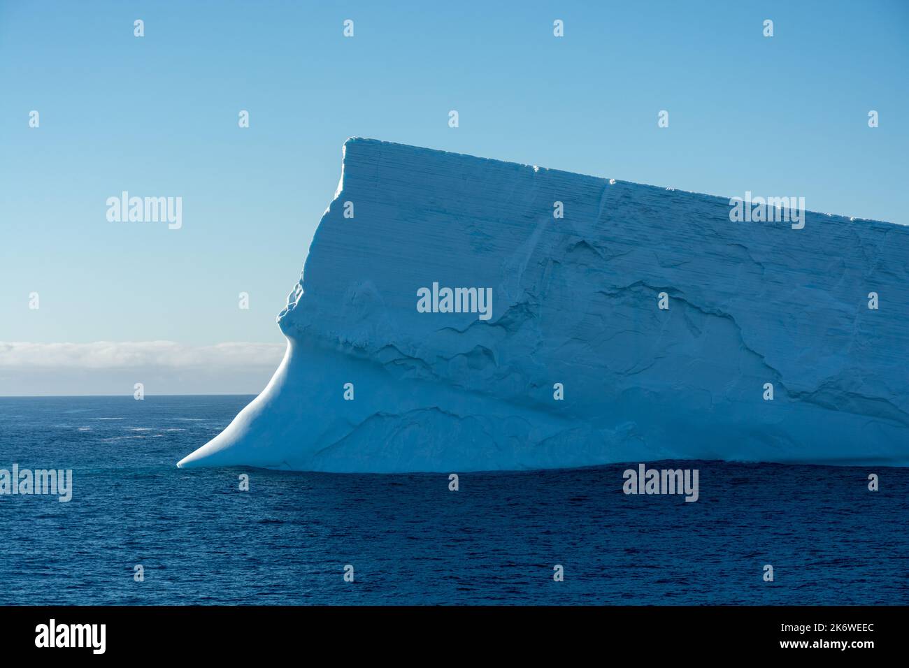 corner of large tabular (table) iceberg in southern ocean off antarctic ...