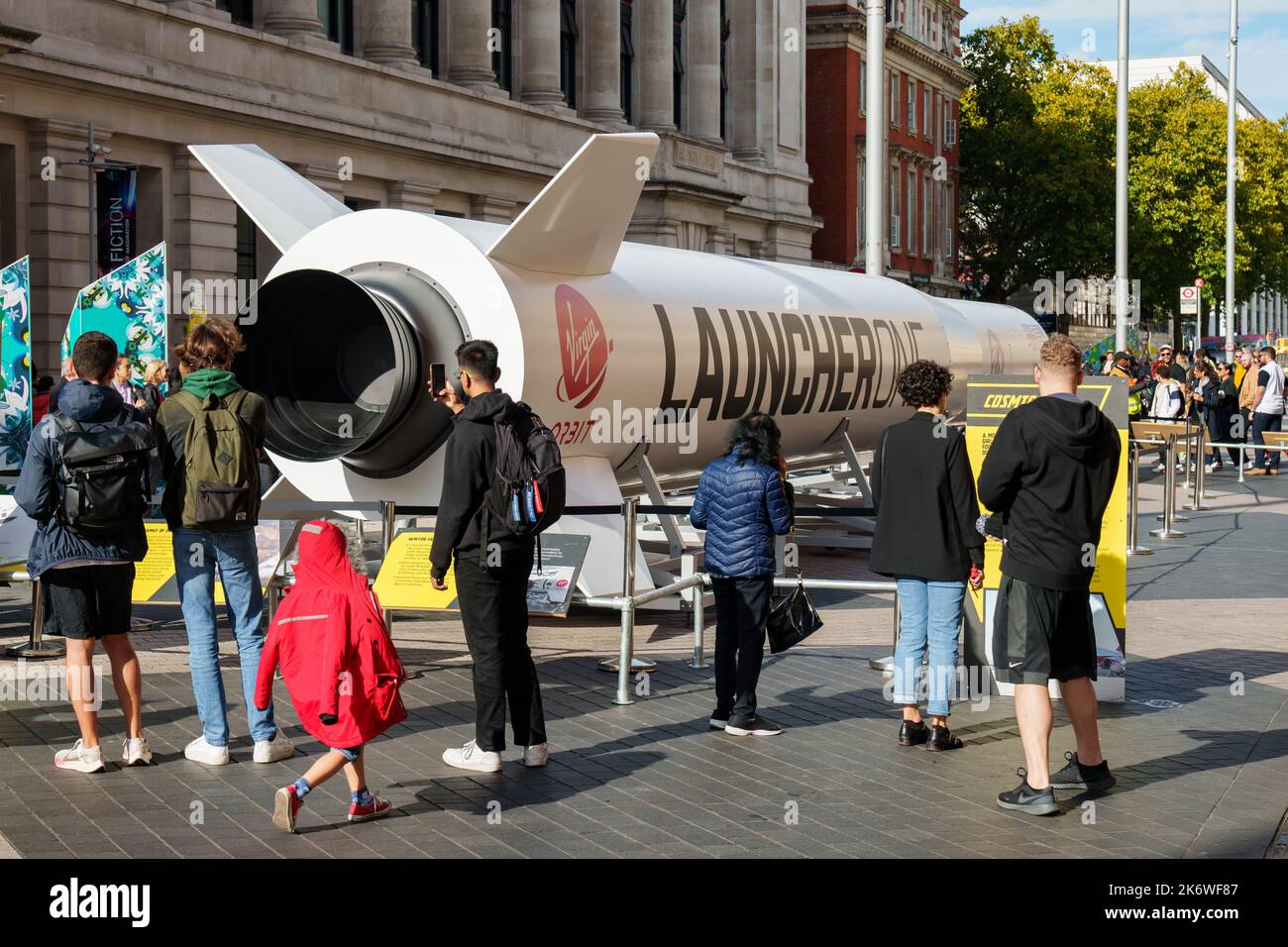 EDITORIAL USE ONLY Members of the public look at a 72ft life size ...