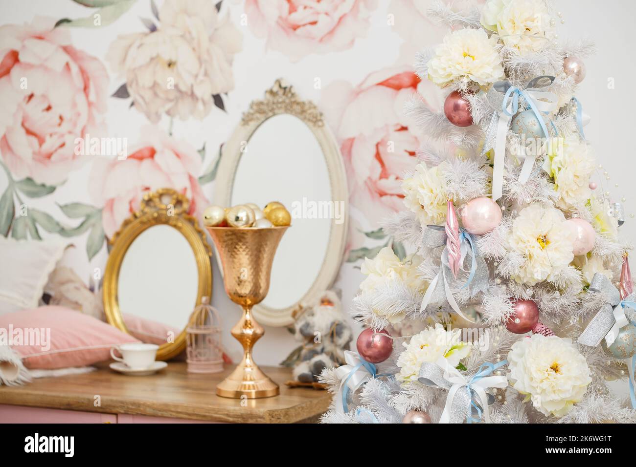 Christmas decorations on the tree, beautiful toys in light colors ...