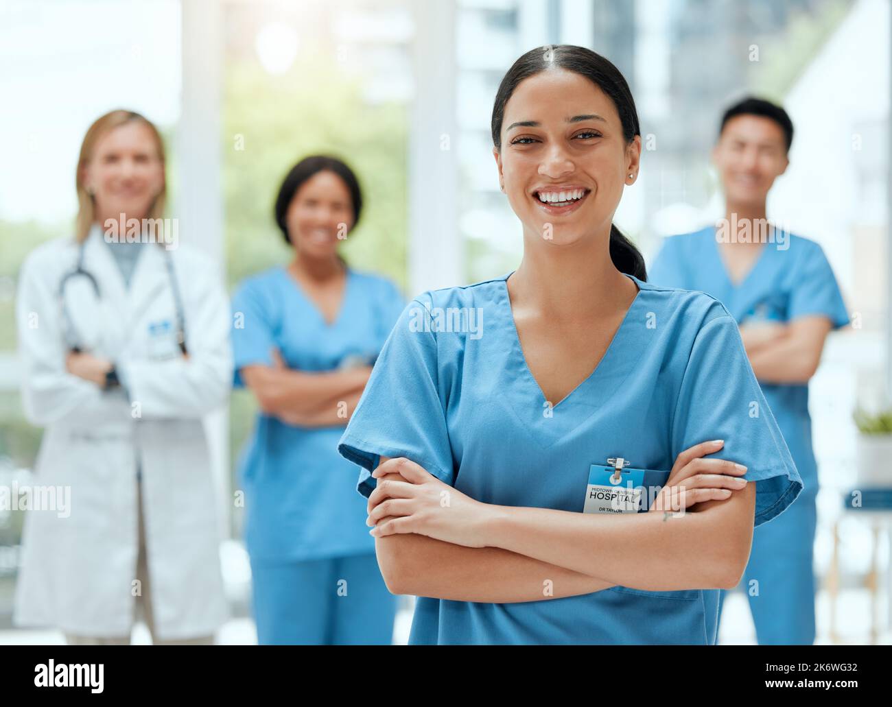 We can be good together. a group of medical practitioners standing ...