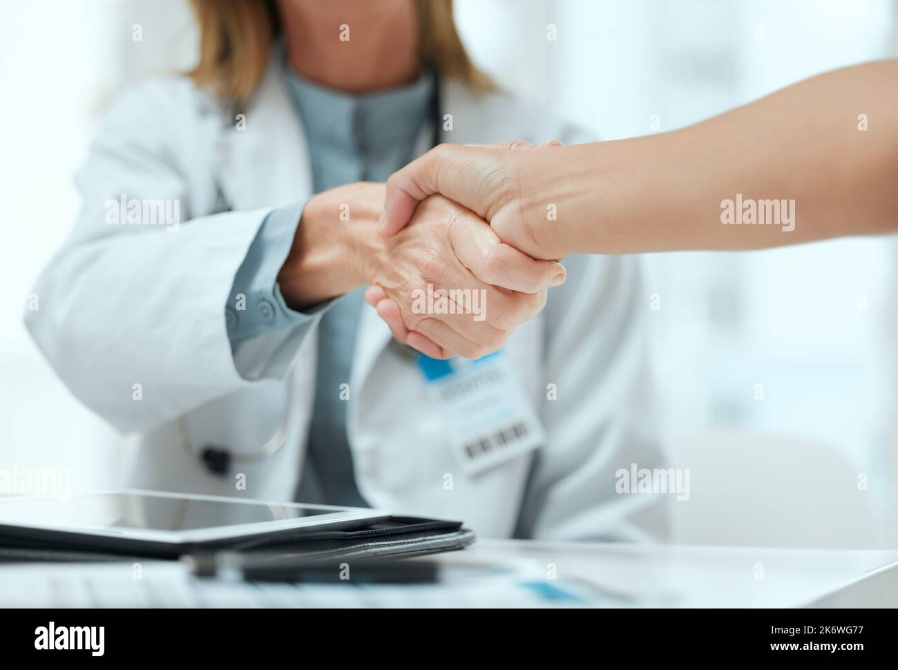 The start of great things. two unrecognizable doctors shaking hands at ...