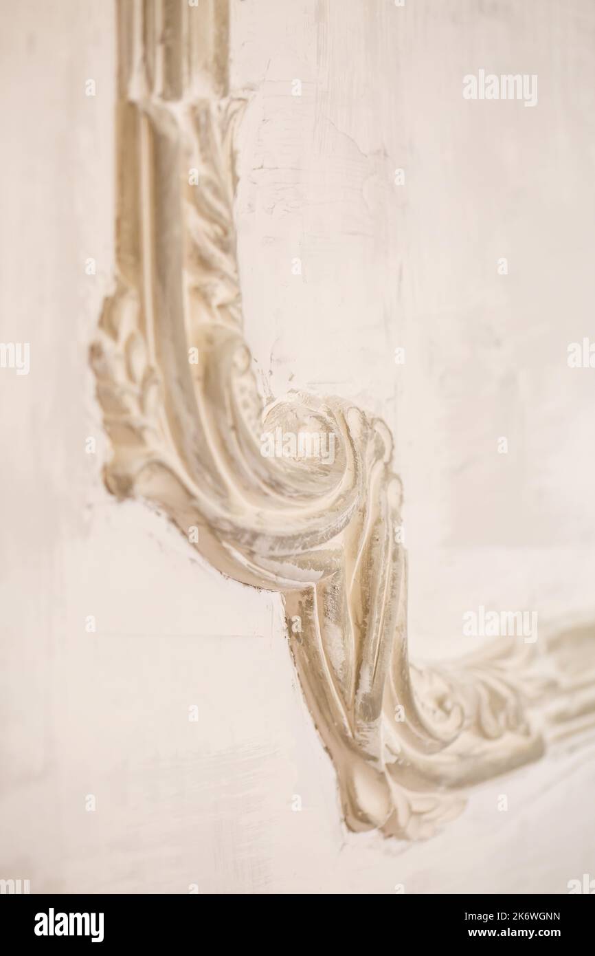 Beautiful plaster wall decor. Plaster decorations on the wall during ...