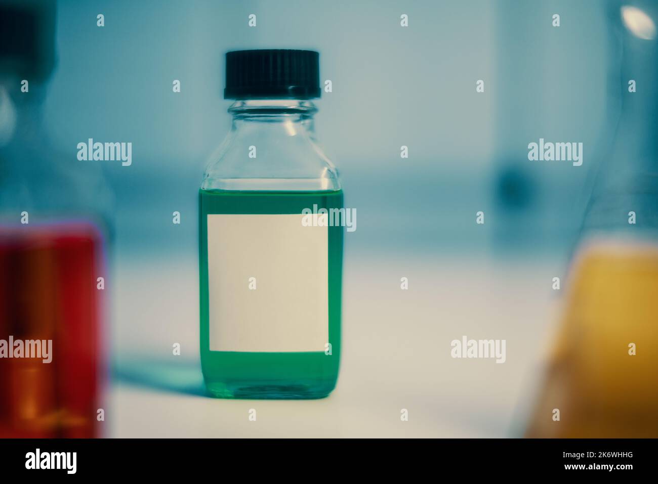 chemical bottle with blank sticker in chemistry lab Stock Photo - Alamy