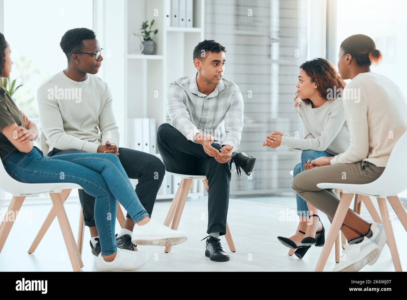 How did that make you feel. a diverse group of people sitting together ...