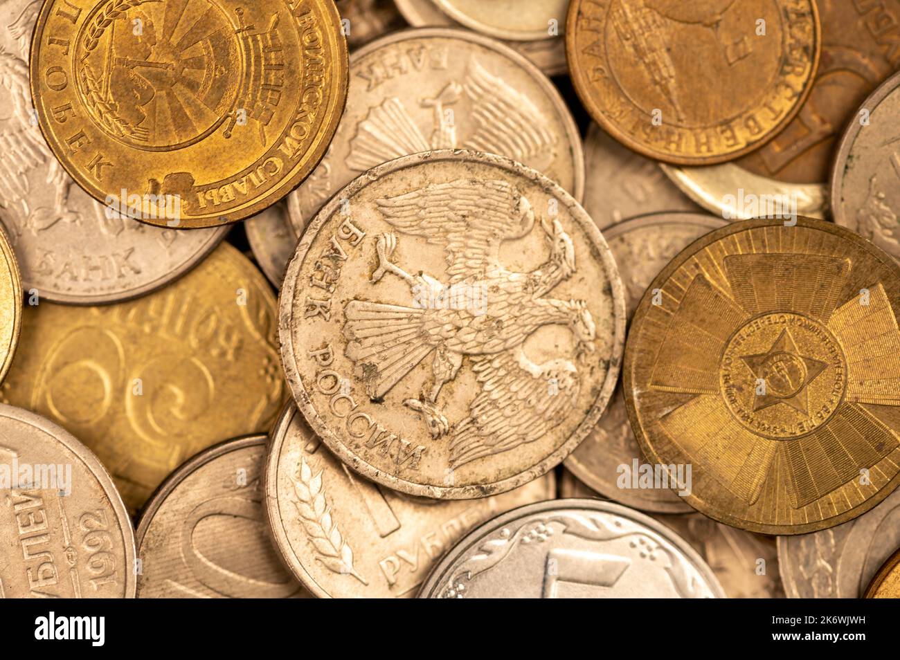 Old coins of the USSR in bulk on a flat surface, background image ...