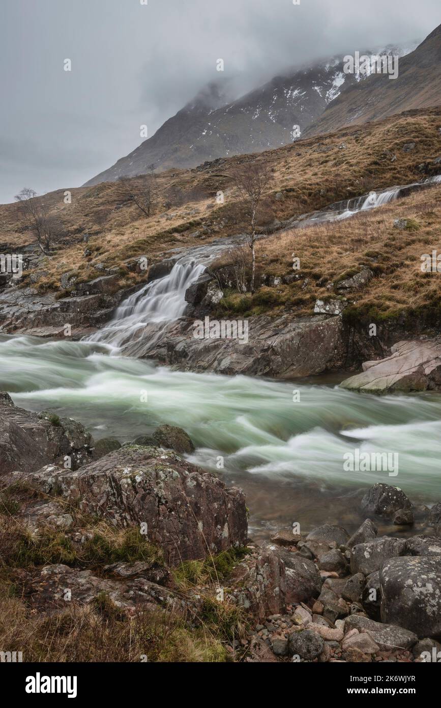 Beautiful Winter landscape image of River Etive and Skyfall Etive ...