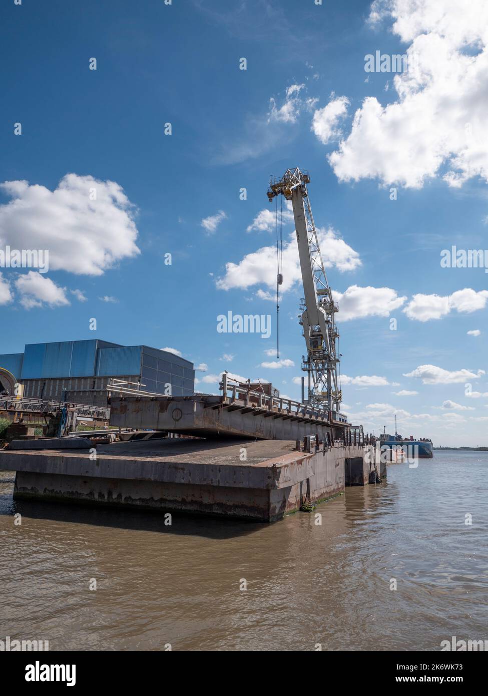 Floating crane to lift heavy industrial ships onto dry land Stock Photo ...