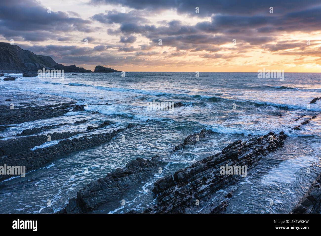 Beautiful aerial drone landscape sunset image of Welcombe Mouth Beach ...