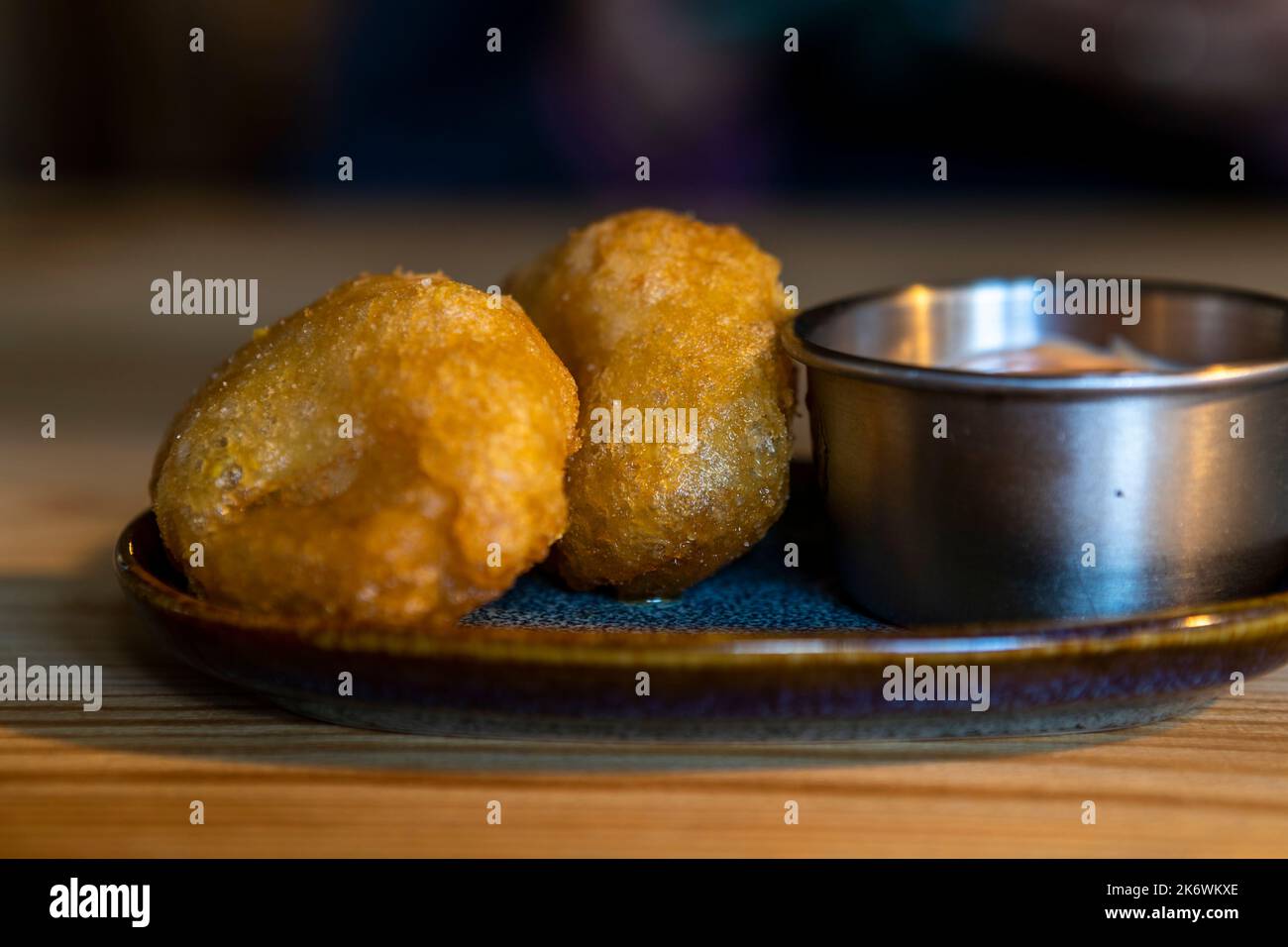 Scallop fritters with a specy dip. Tasty entree served at THe Bell at ...